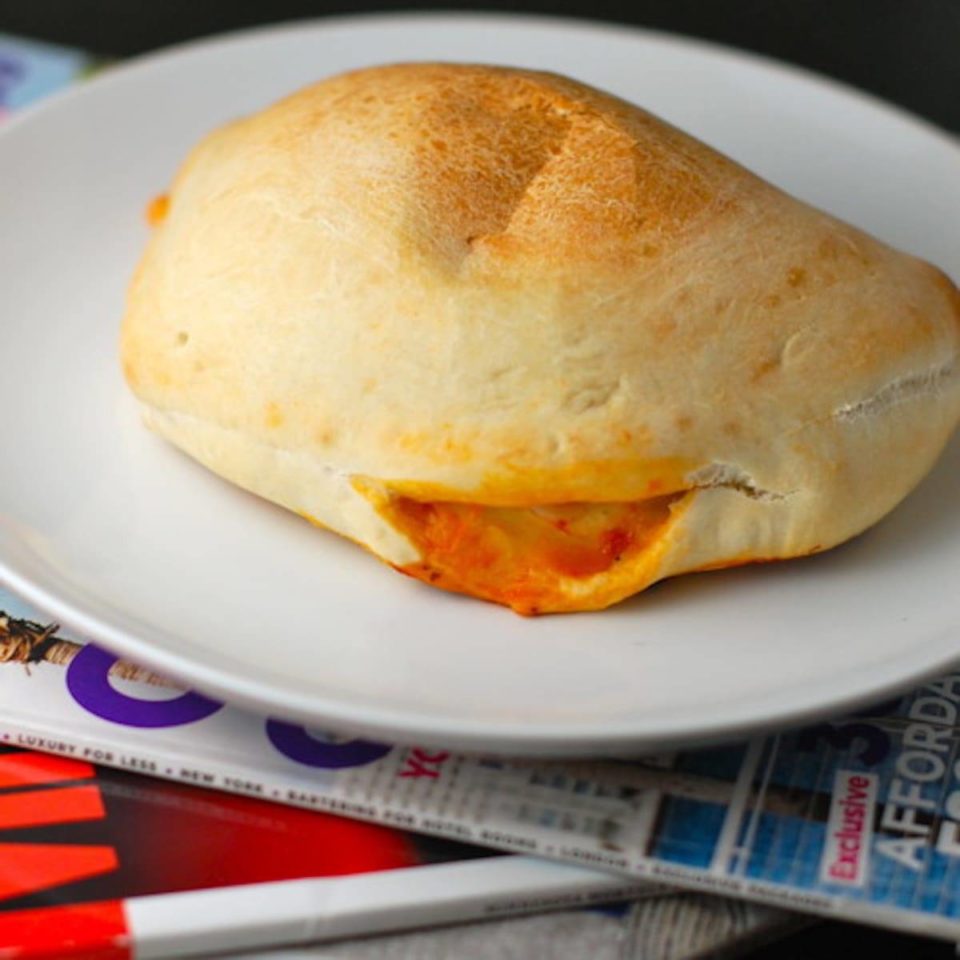 Sausage and Mozzarella Calzone Recipe - Pinch of Yum